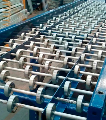 Transportadores de rodajas tipo patin - Simasa Conveyors